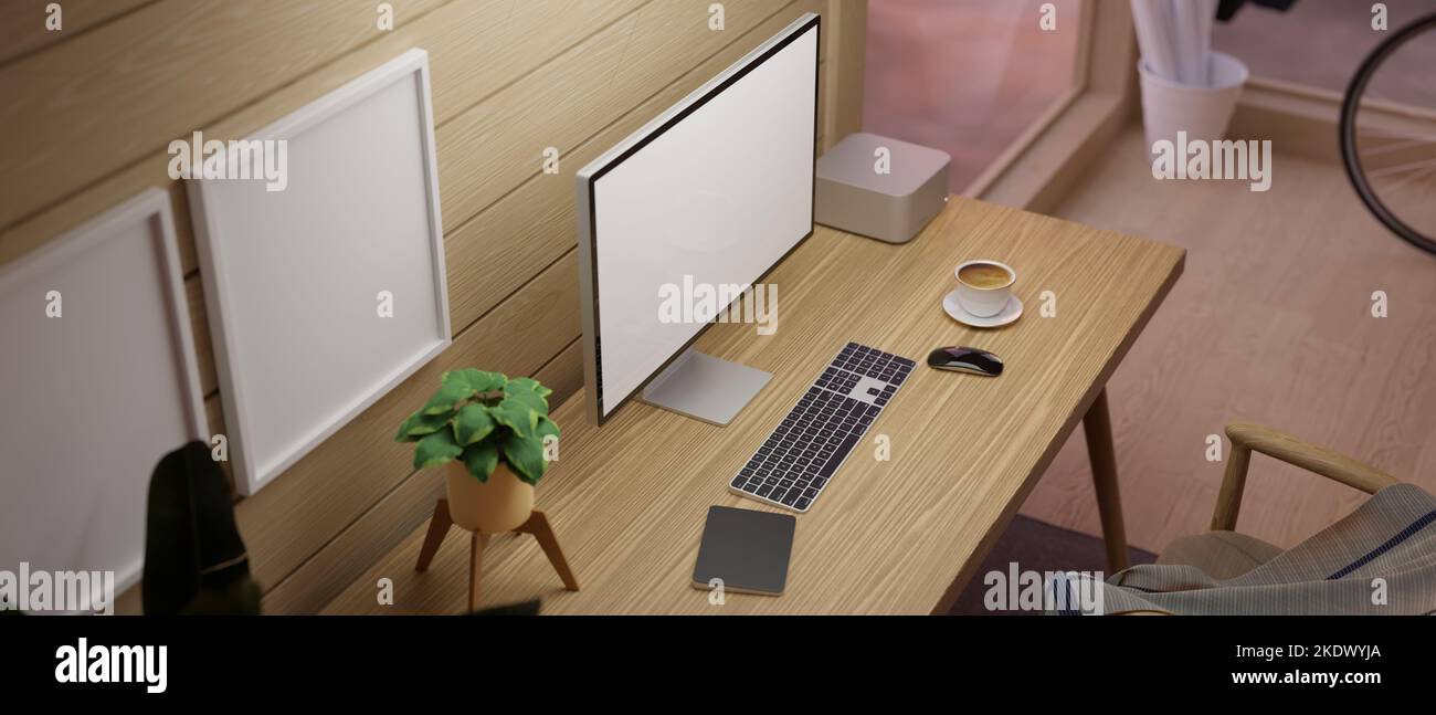 Comfy wooden workspace with blank screen PC desktop computer on wooden ...