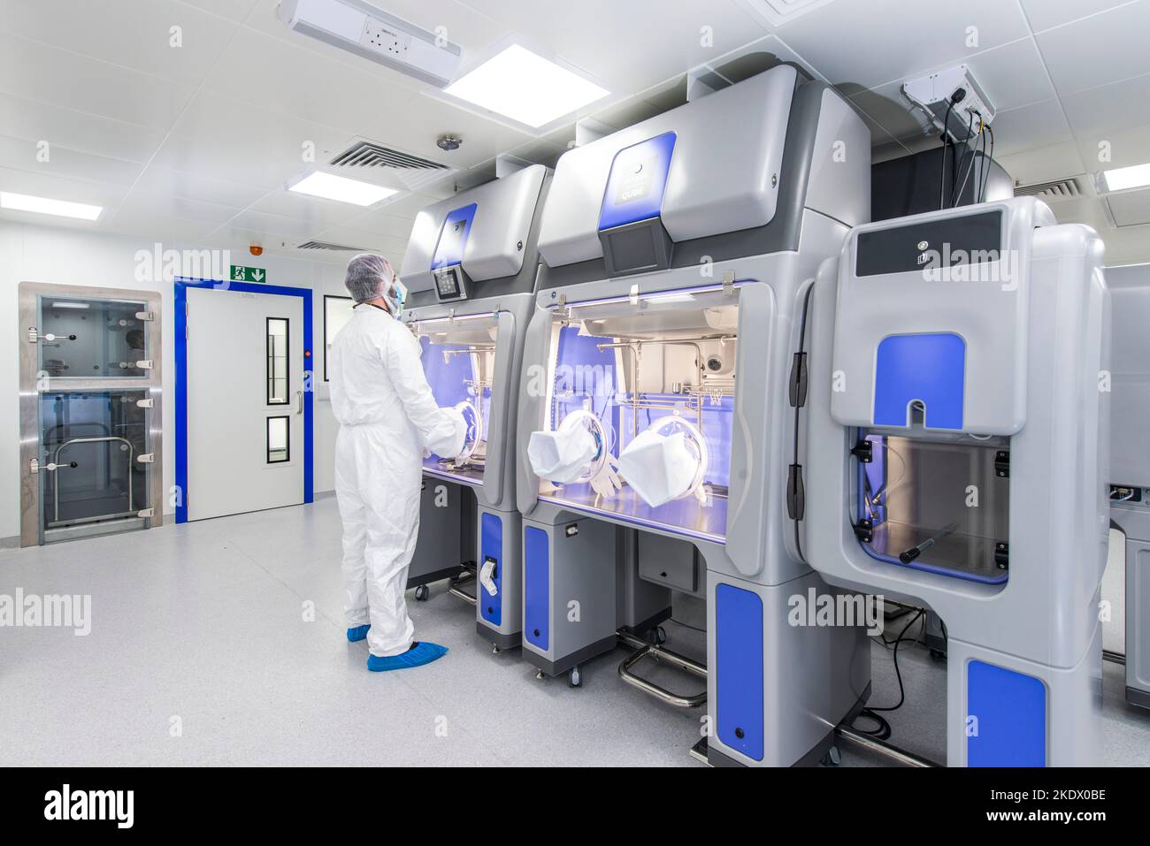 Researcher using an aseptic work station Stock Photo - Alamy
