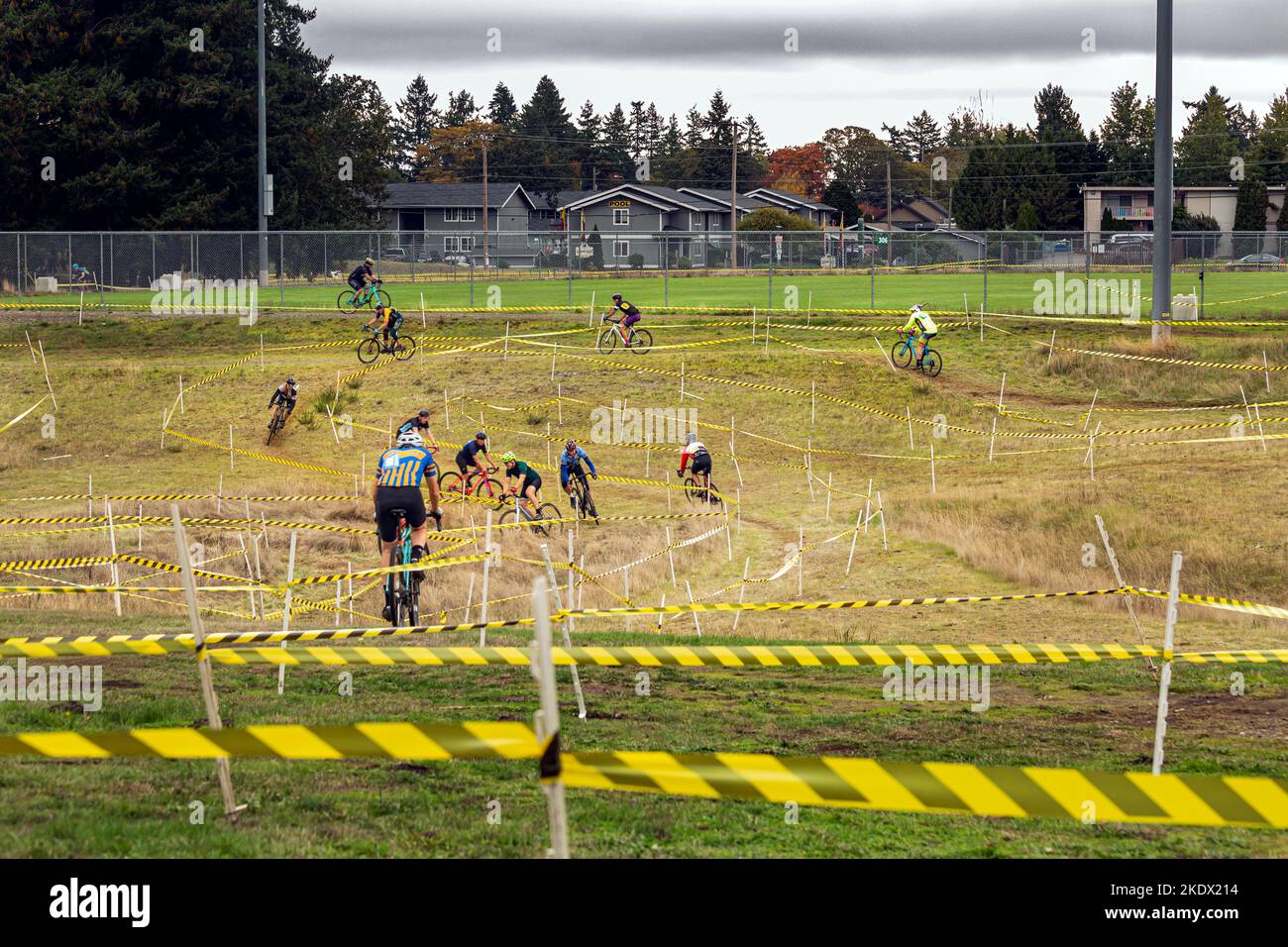 WA21787-00...WASHINGTON - Cyclocross racers riding through a section of ...