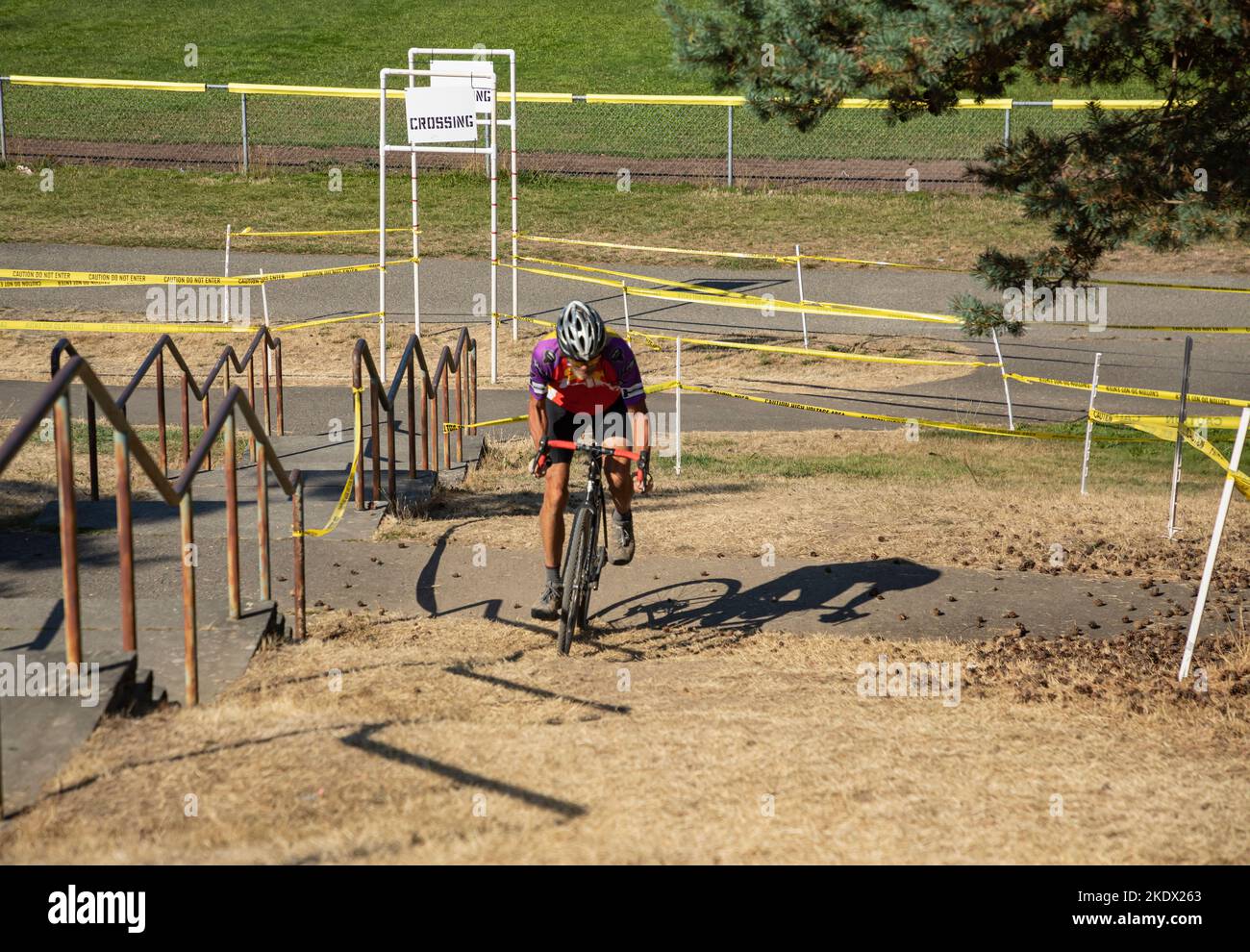 WA22611-00...WASHINGTON - Tom Kirkendall riding up a short, steep hill ...