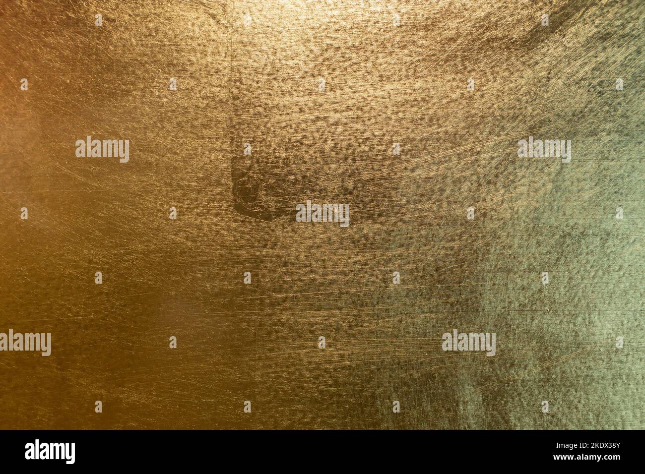 golden sheets on a table, soft focus close up Stock Photo - Alamy