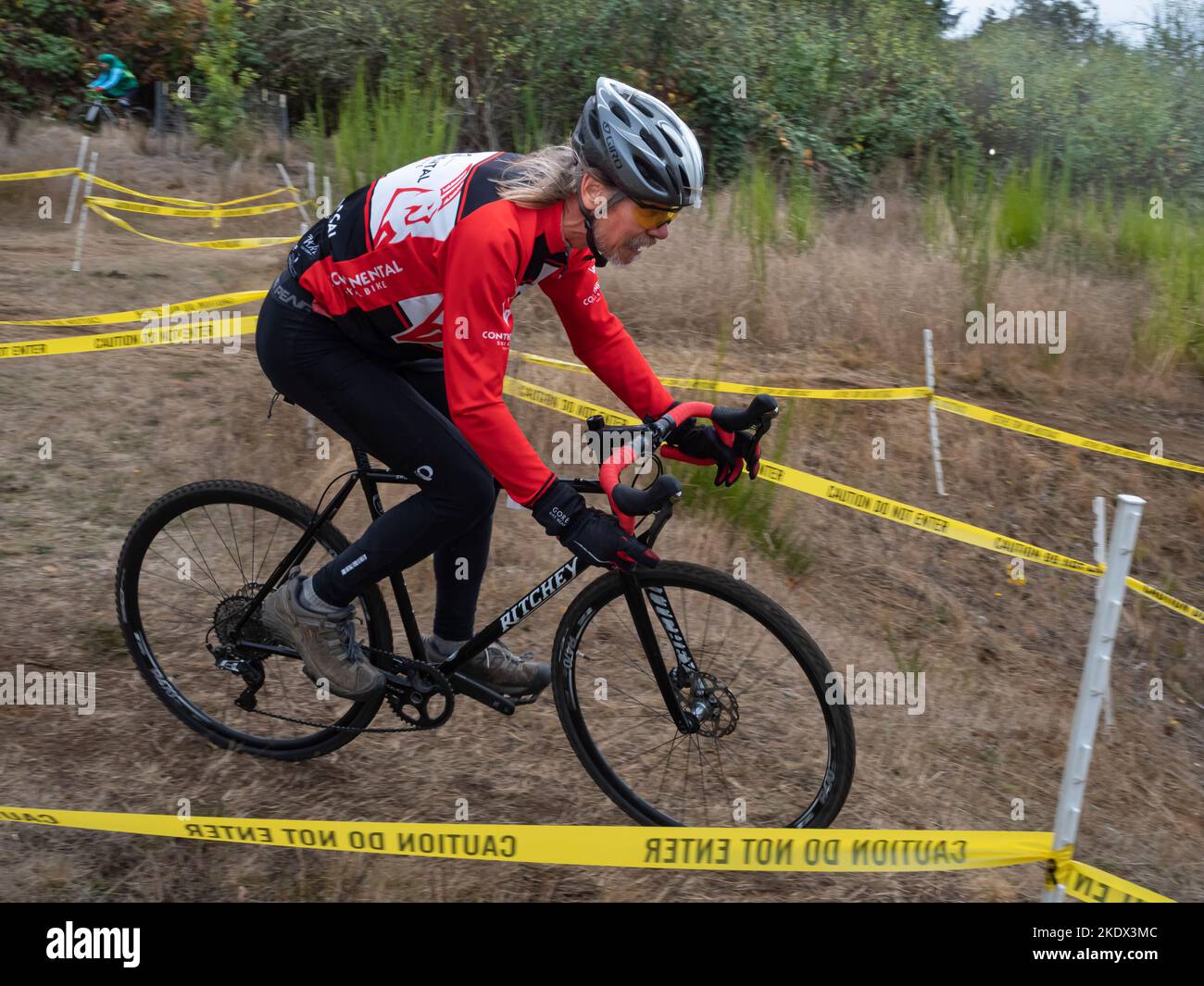 WA22756-00...WASHINGTON - Tom Kirkendall descending into the gravel pit ...