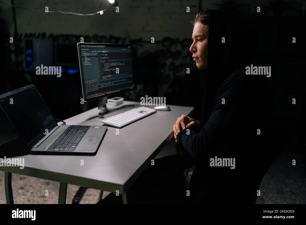 Focused programmer wearing dark hi-res stock photography and images - Alamy