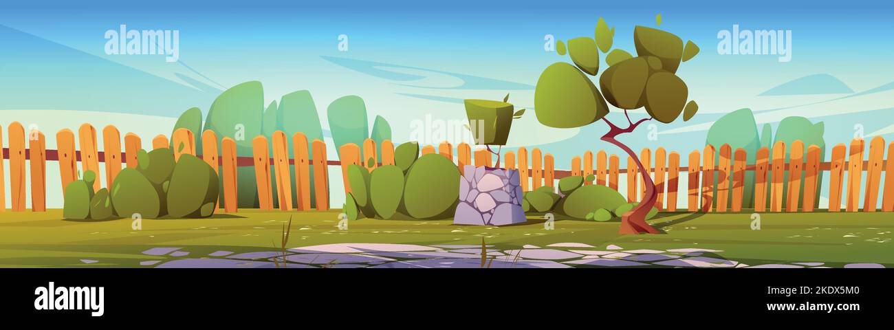 Backyard with wooden fence, green grass, bushes, trees and topiary ...