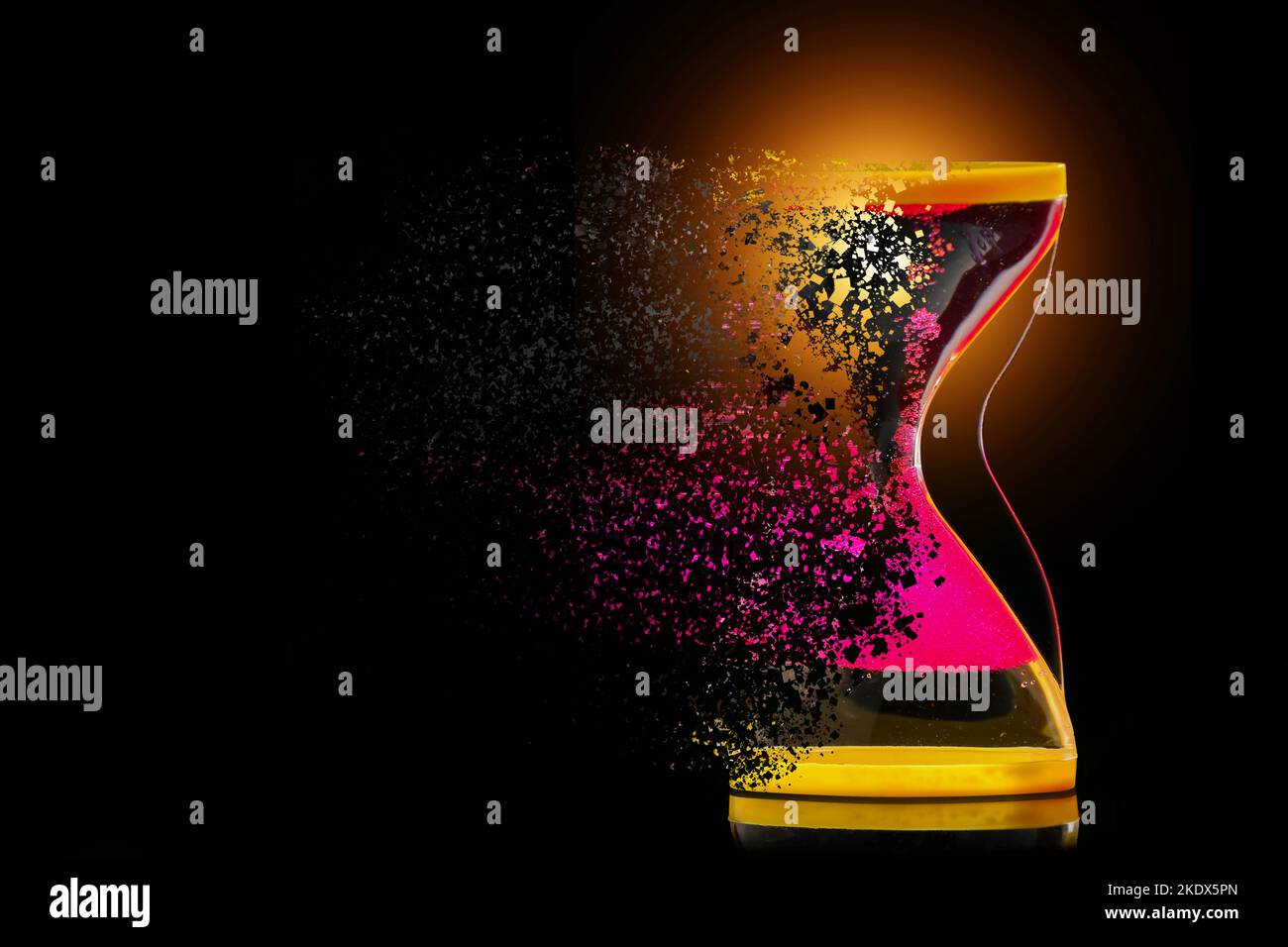 Disappearing hourglass on dark background with space for text Stock ...