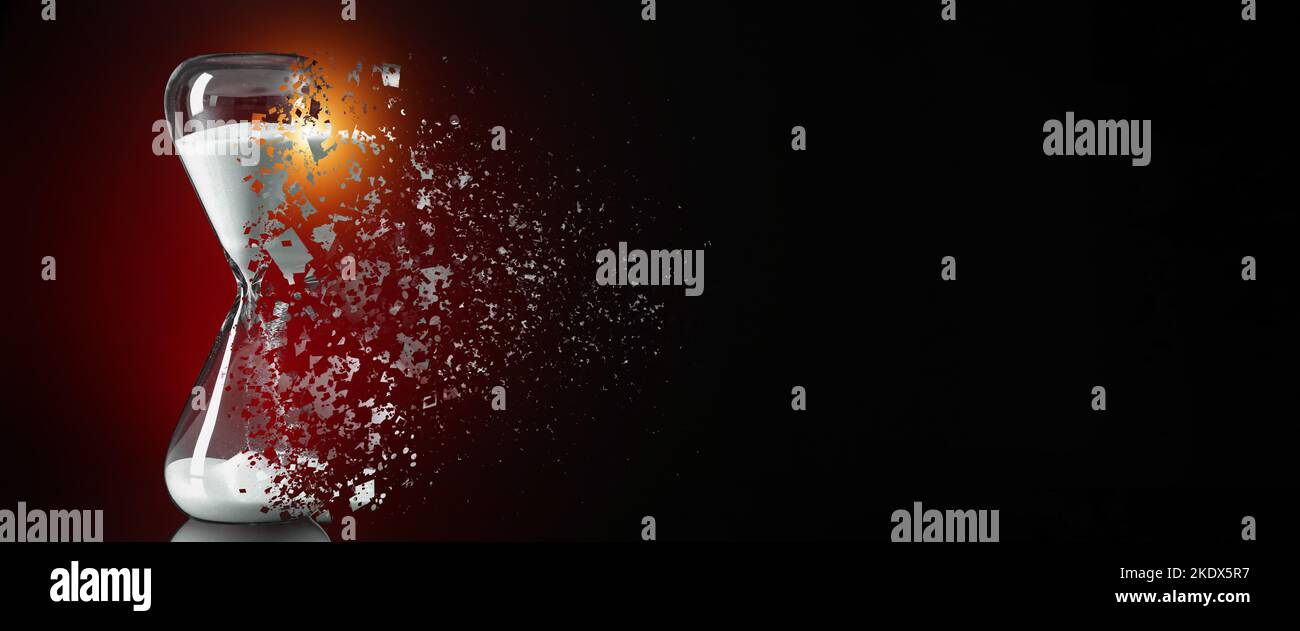 Disappearing hourglass on dark background with space for text Stock ...