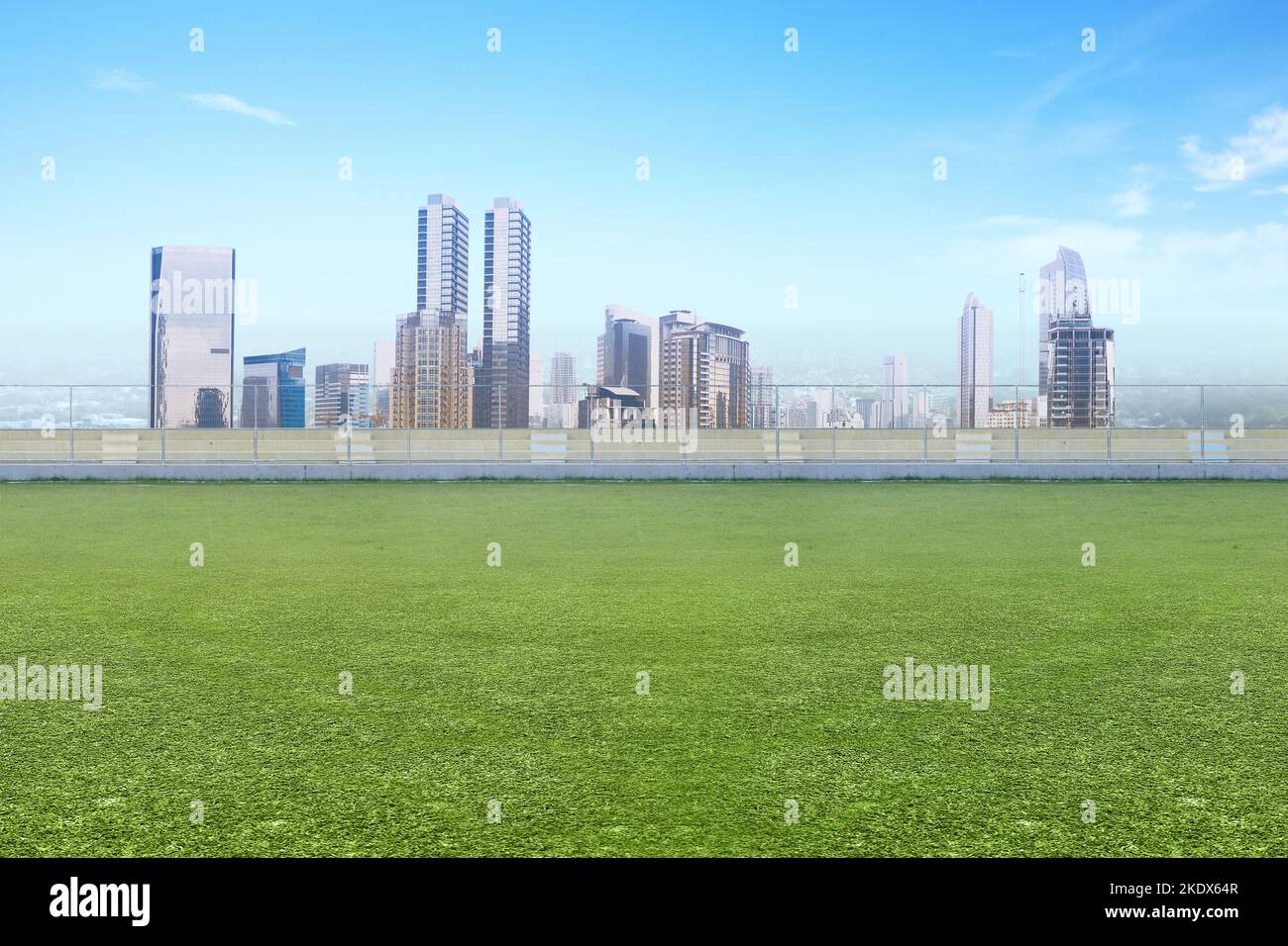 Grass inside the football stadium with a cityscapes background Stock ...