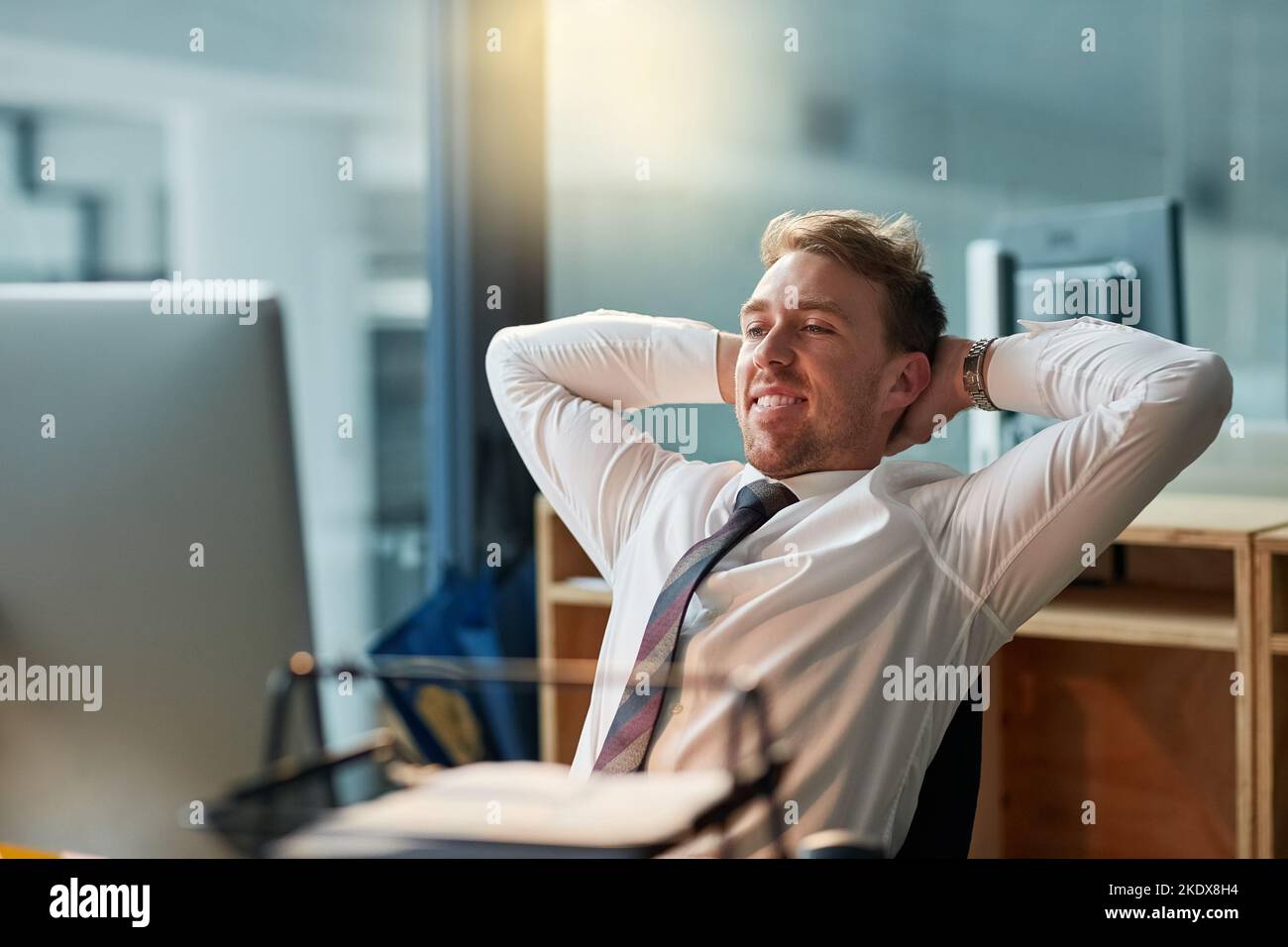 Businessman desk office leaning back hi-res stock photography and ...