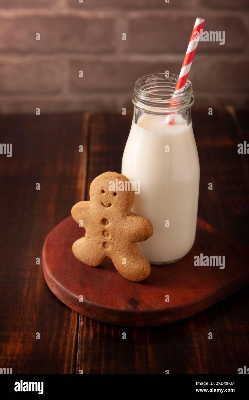 Homemade gingerbread man cookies and milk, traditionally made at ...
