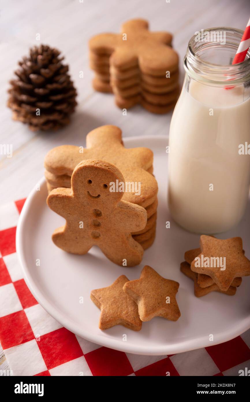 Homemade gingerbread man cookies and milk, traditionally made at ...