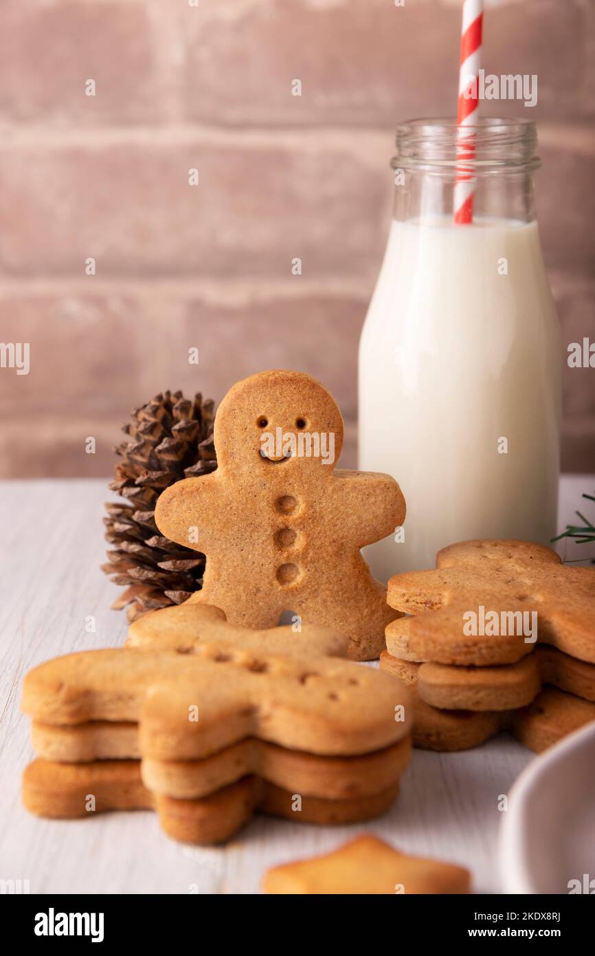 Homemade gingerbread man cookies and milk, traditionally made at ...