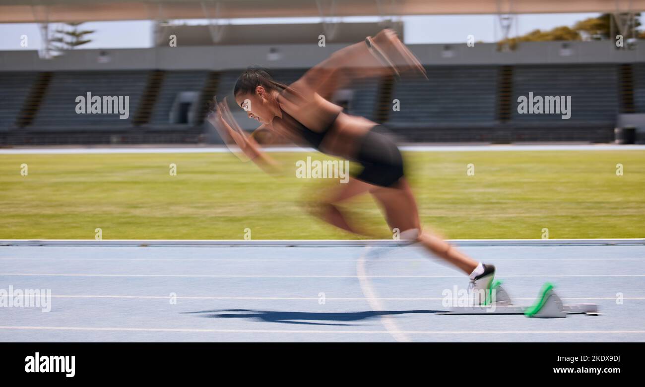 Fitness, run and fast blur athlete running on a race track for sports ...
