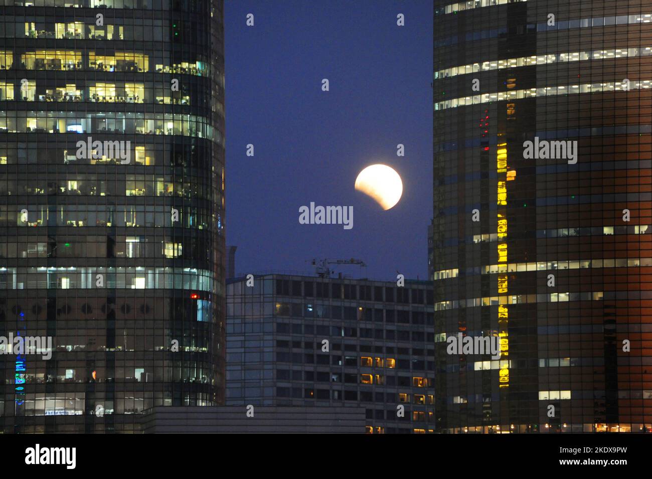 The blood moon is seen during a total lunar eclipse in Shanghai, China ...