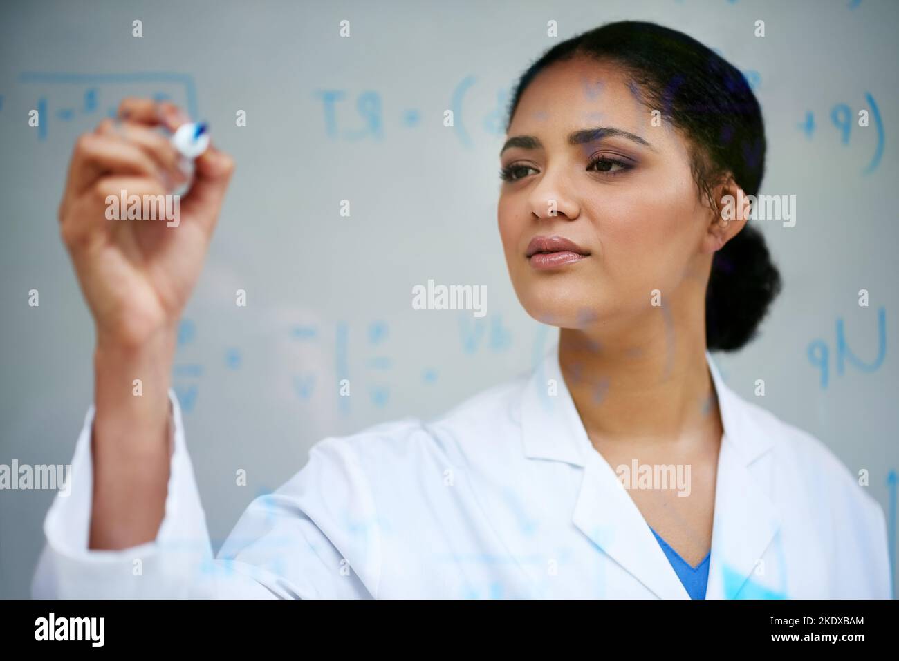 Some equations are life-saving. an attractive young female scientist ...