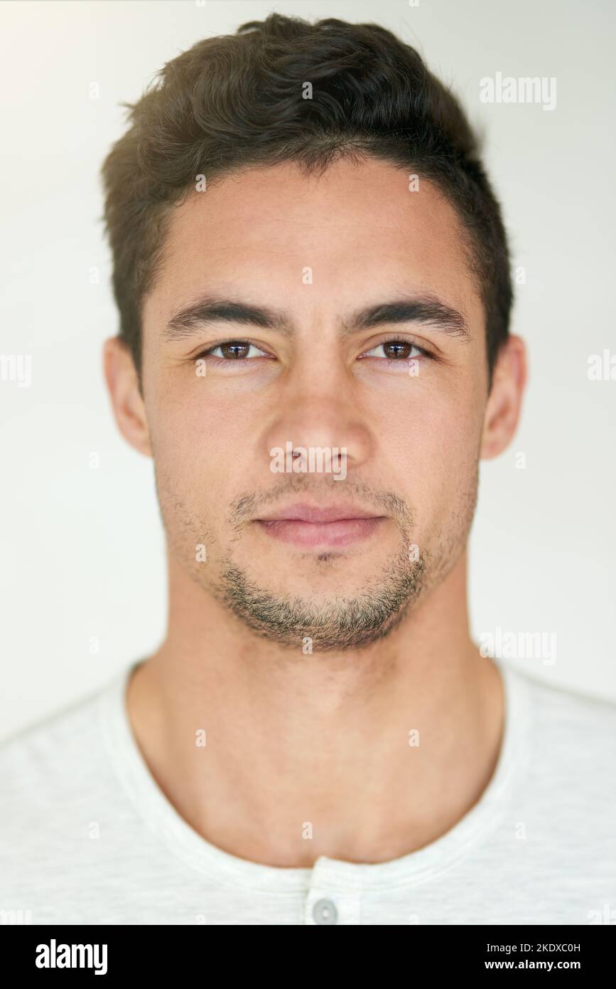 Straight up handsomeness. Studio portrait of a young man posing against ...