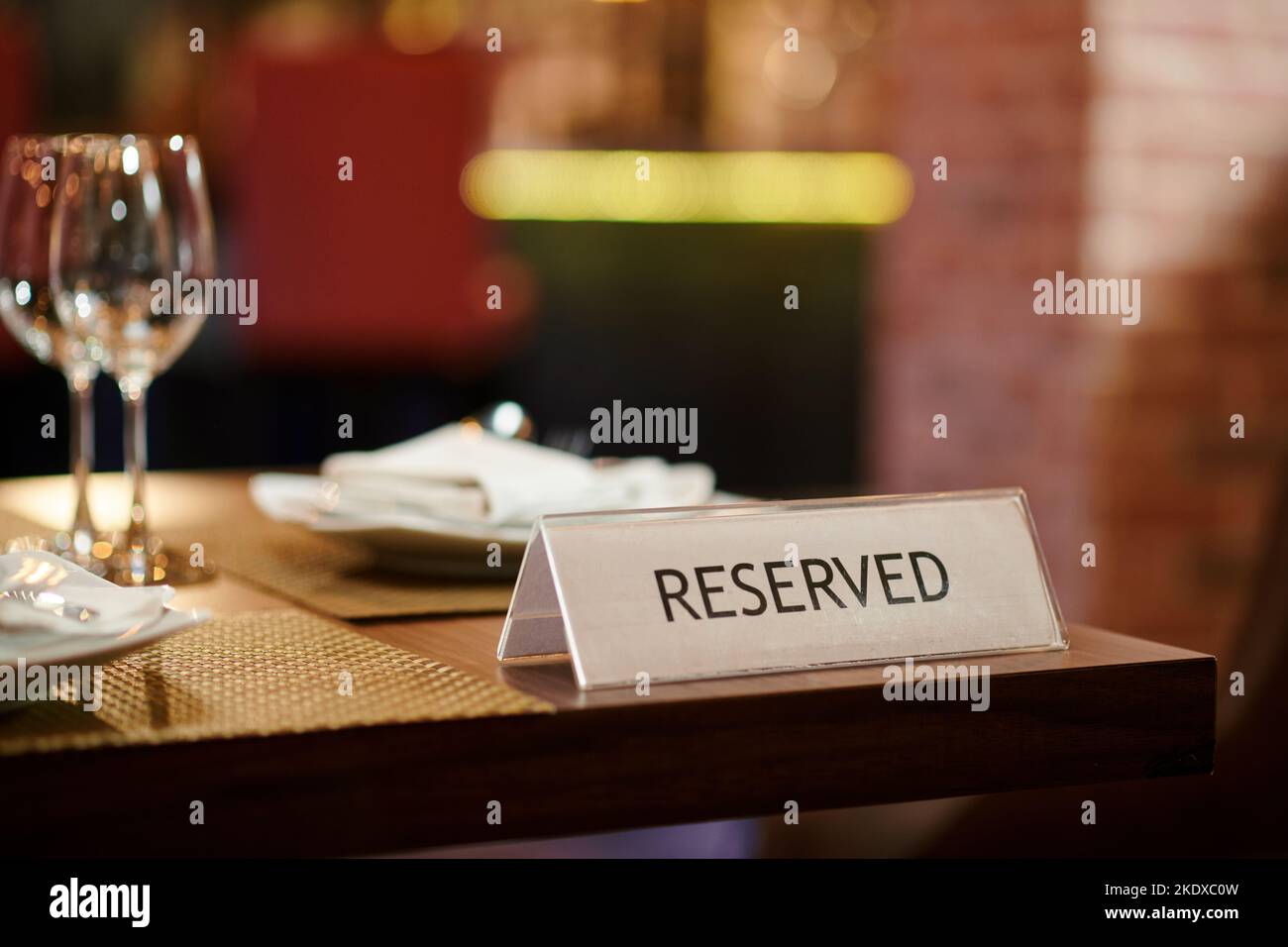 Reserved table sign on restaurant table, booking concept Stock Photo ...