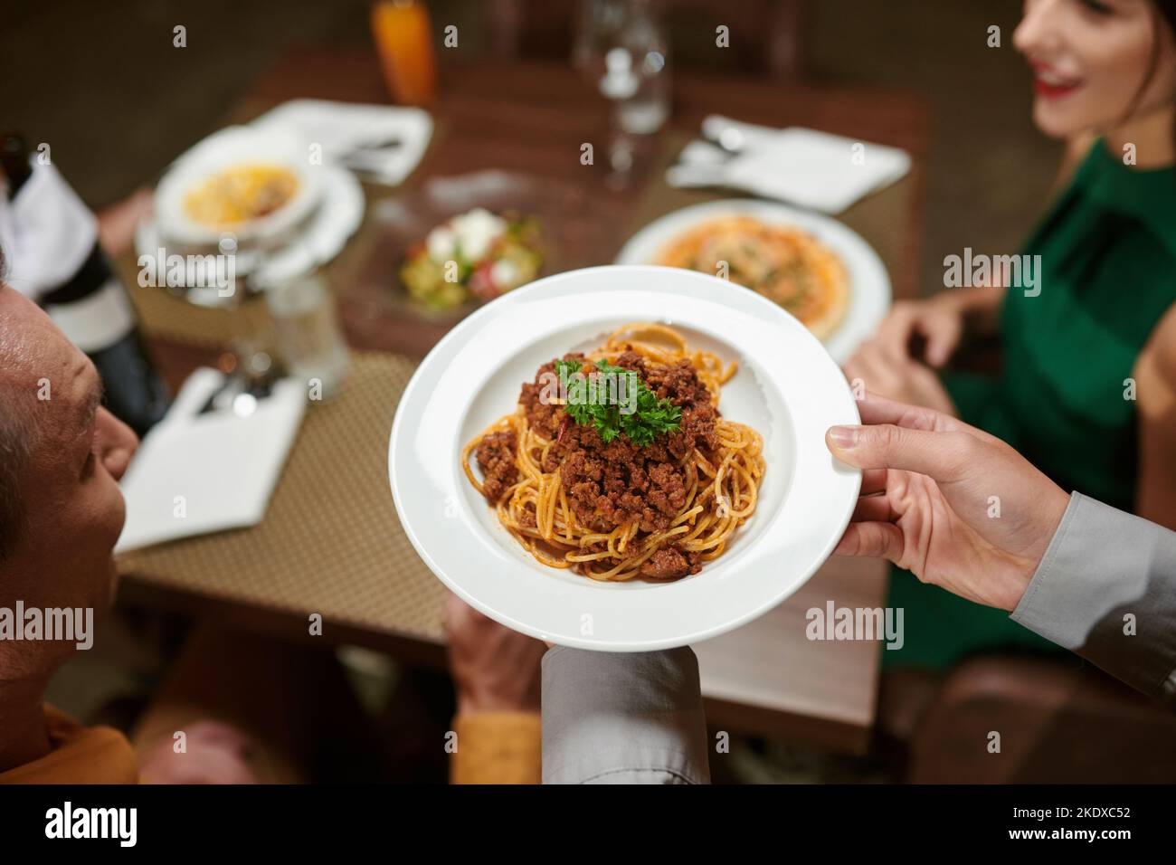 Family eating spaghetti bolognese hi-res stock photography and images ...