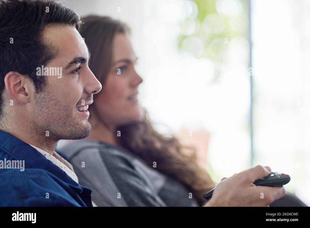 Watching tv at home real hi-res stock photography and images - Alamy