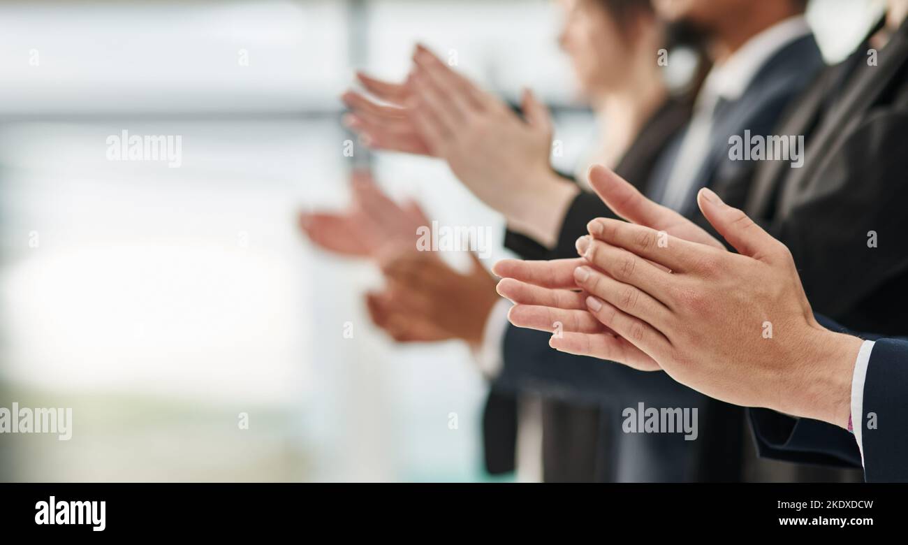 That was on point. a group of unrecognizable businesspeople clapping ...