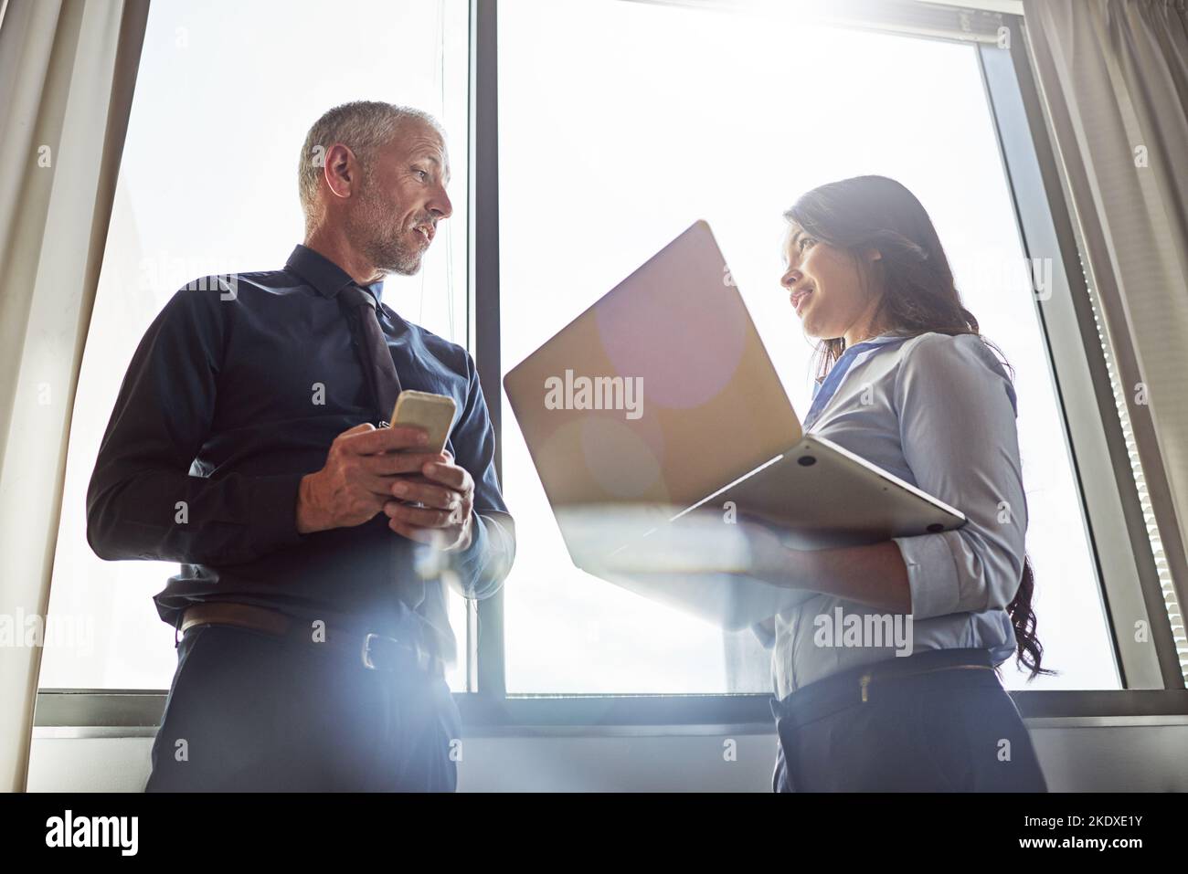 I need to run something by you. a young businesswoman addressing a male ...