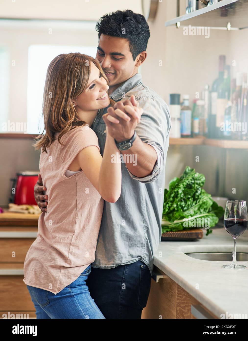 They dance because they love. an affectionate young couple dancing in ...