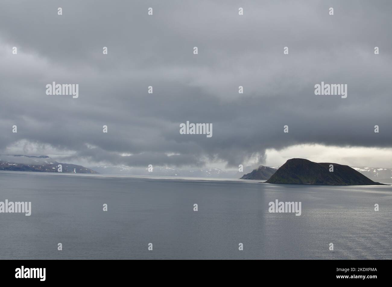 cloudy Fjord Norway ocean mirroring cold water Stock Photo - Alamy