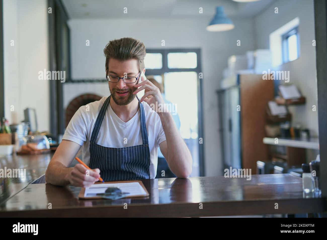 Man men male taking order hi-res stock photography and images - Alamy