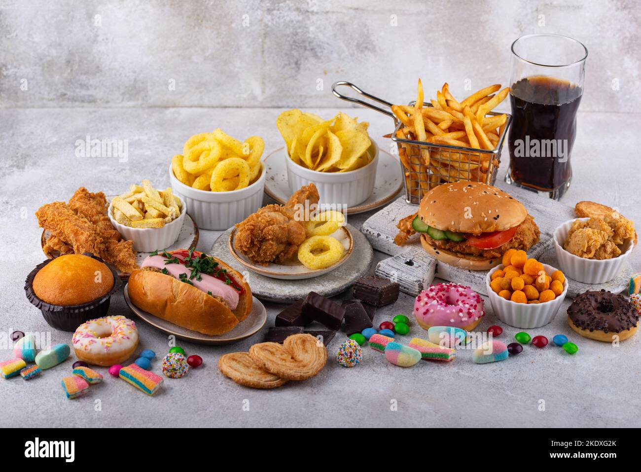 Assortment of various unhealthy junk food Stock Photo - Alamy