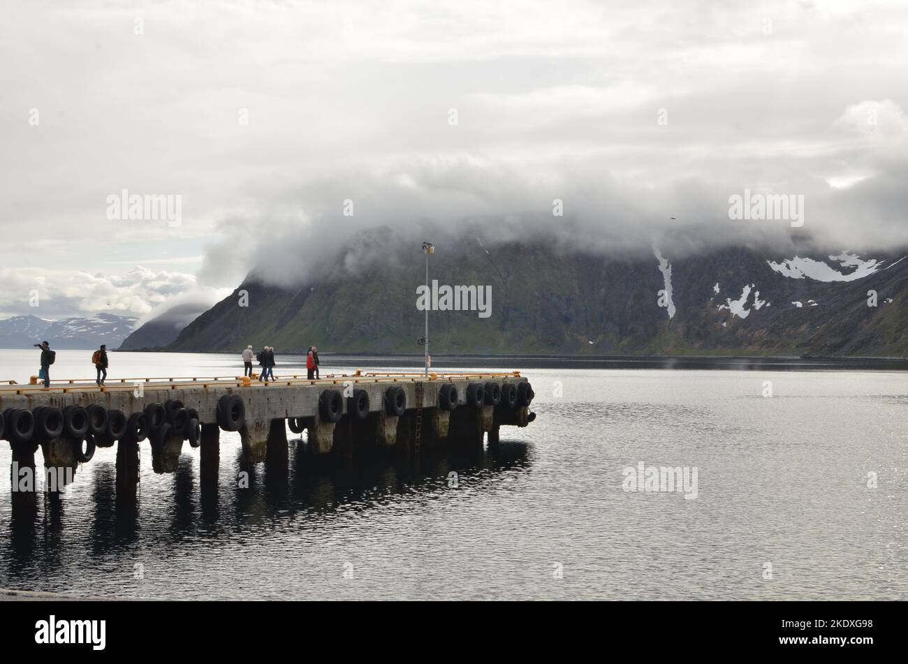 Harbour with smal fishing boats Norway rough cold wet Stock Photo - Alamy