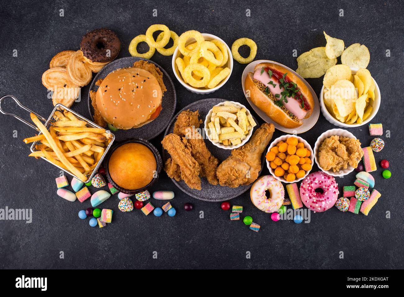 Assortment of various unhealthy junk food Stock Photo - Alamy