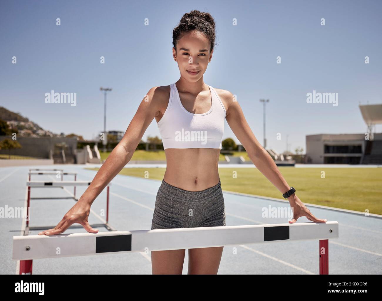 Athlete, portrait and hurdle fitness woman before workout and race on ...