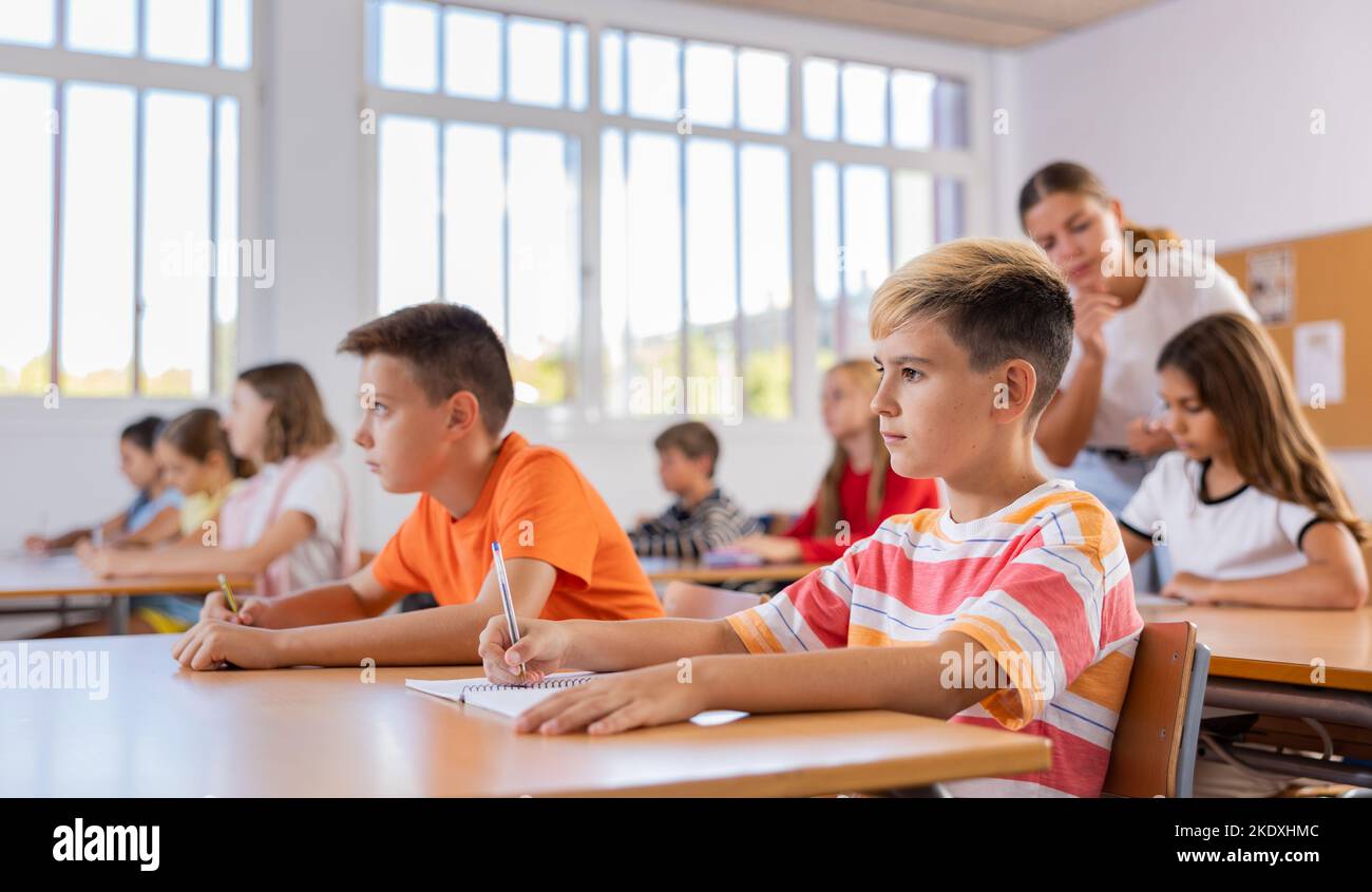 Boys studying in classroom in school Stock Photo - Alamy