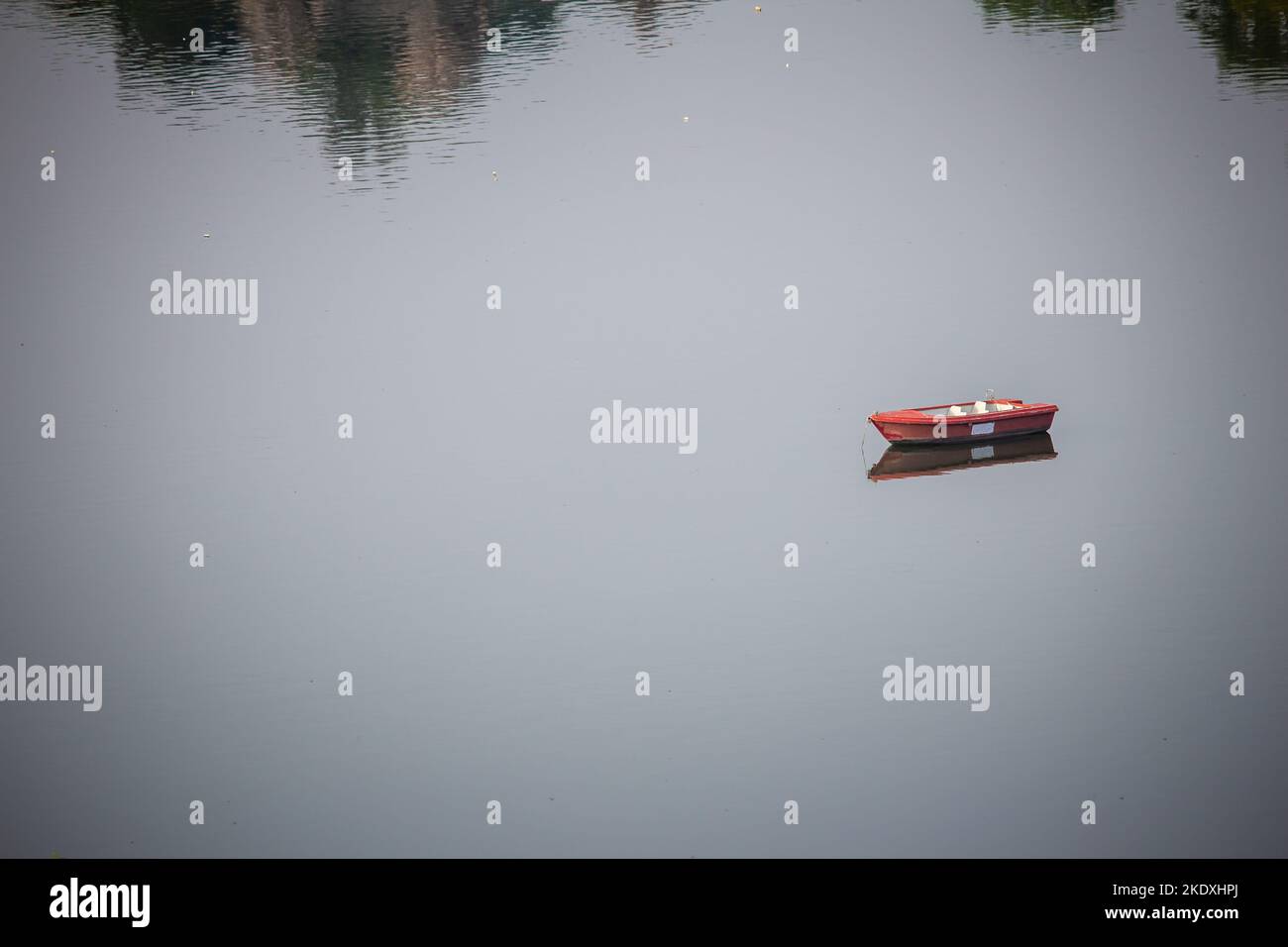 Recreational small boat anchored in the water of Stanley Reservoir ...