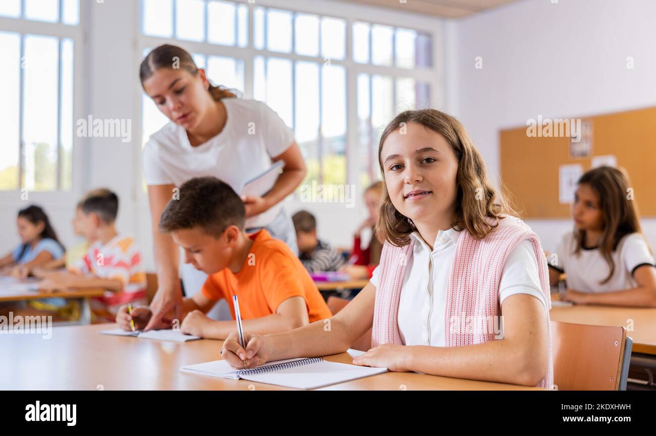 Portrait of girl in classroom Stock Photo - Alamy