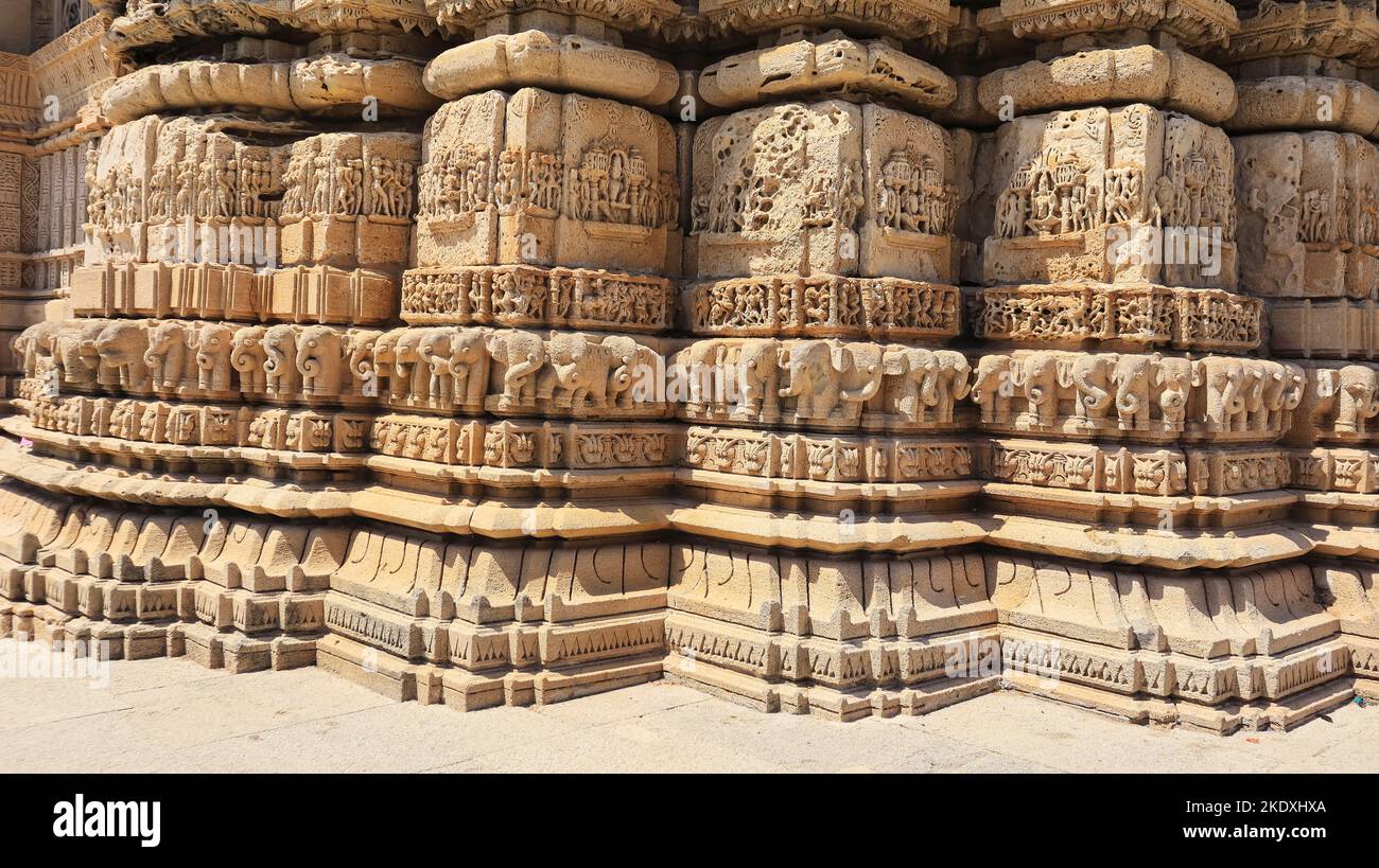 Sculptures of god and goddesses along with male and female figures on ...