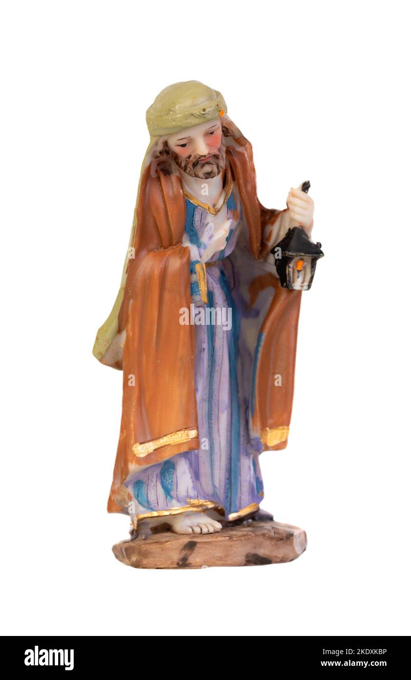 Ceramic figure representing Joseph. Man ceramic figure isolated on a ...