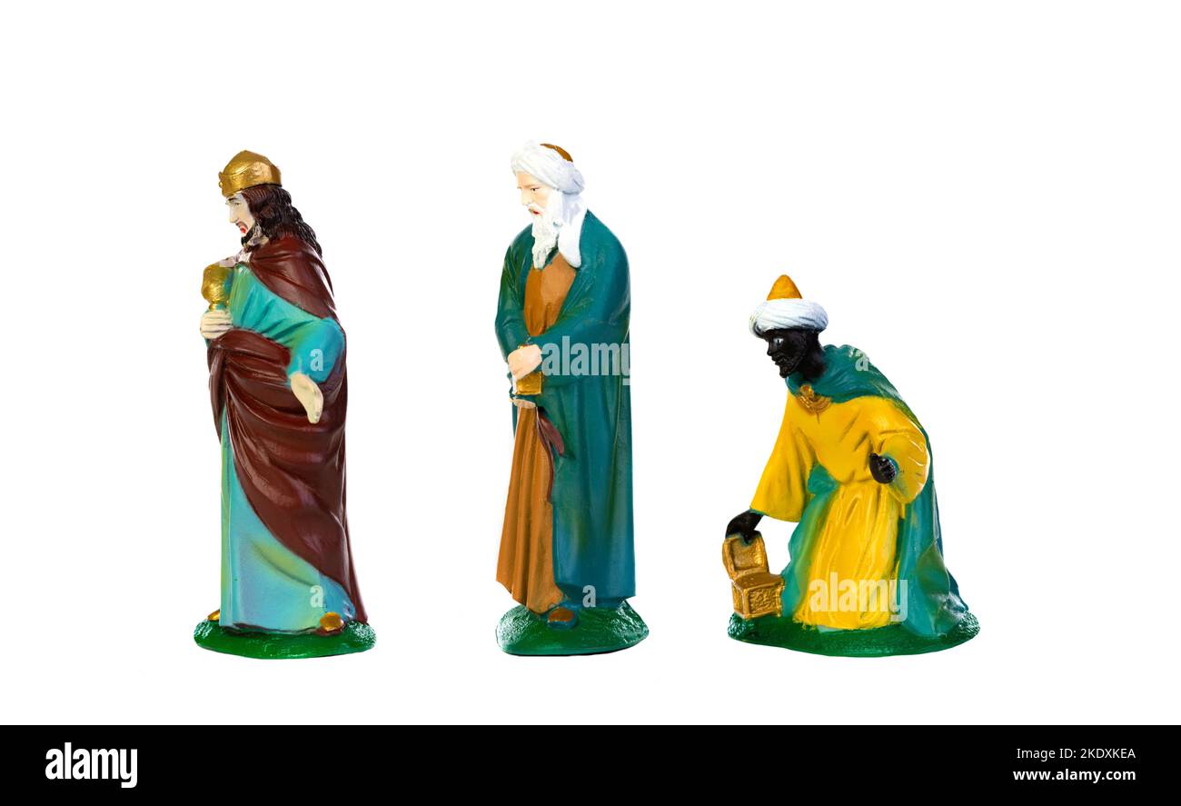 The Christmas magic. Ceramic figure of the wise men isolated on a white ...