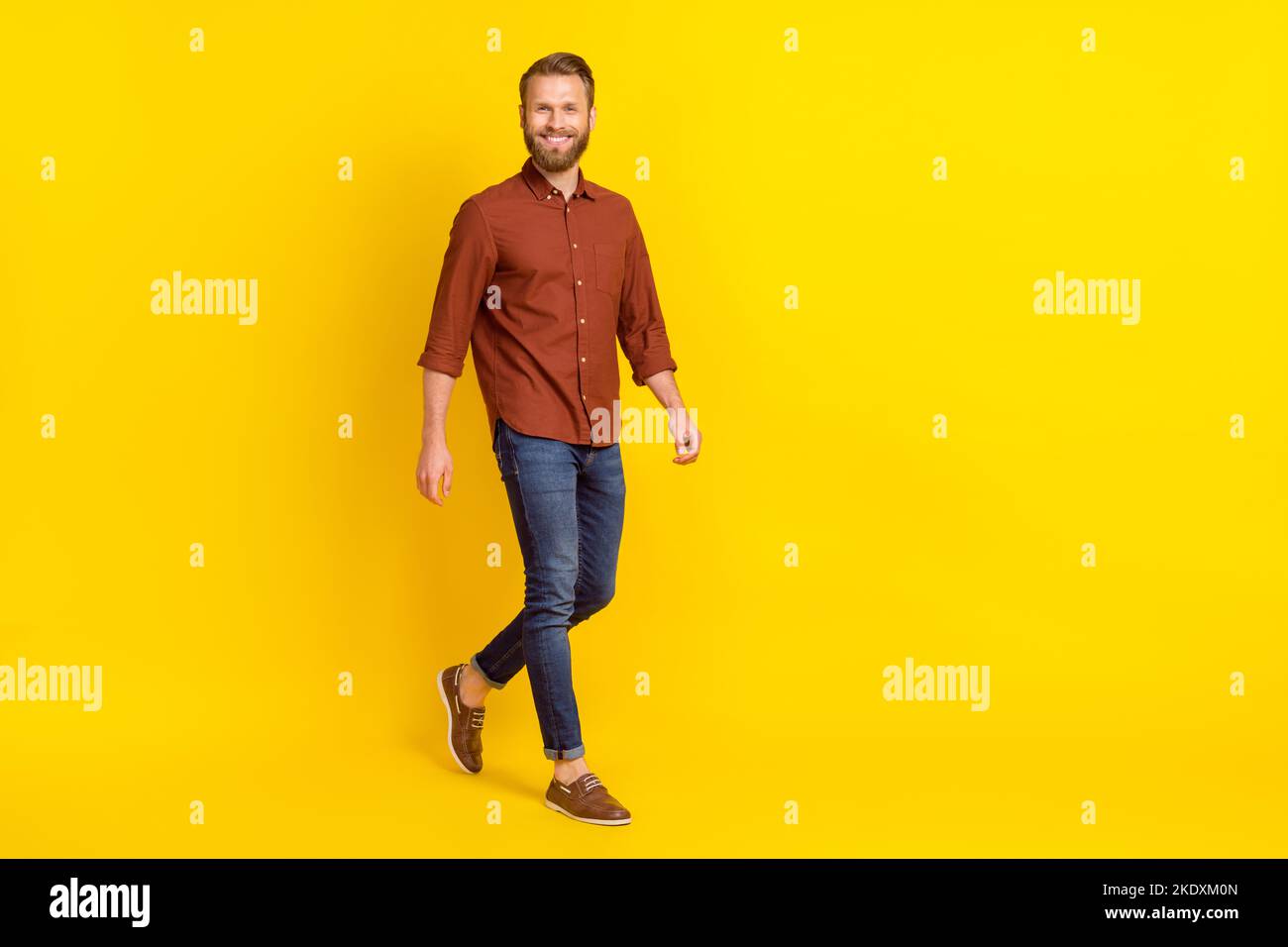 Full body profile portrait of cheerful person have good mood walking ...