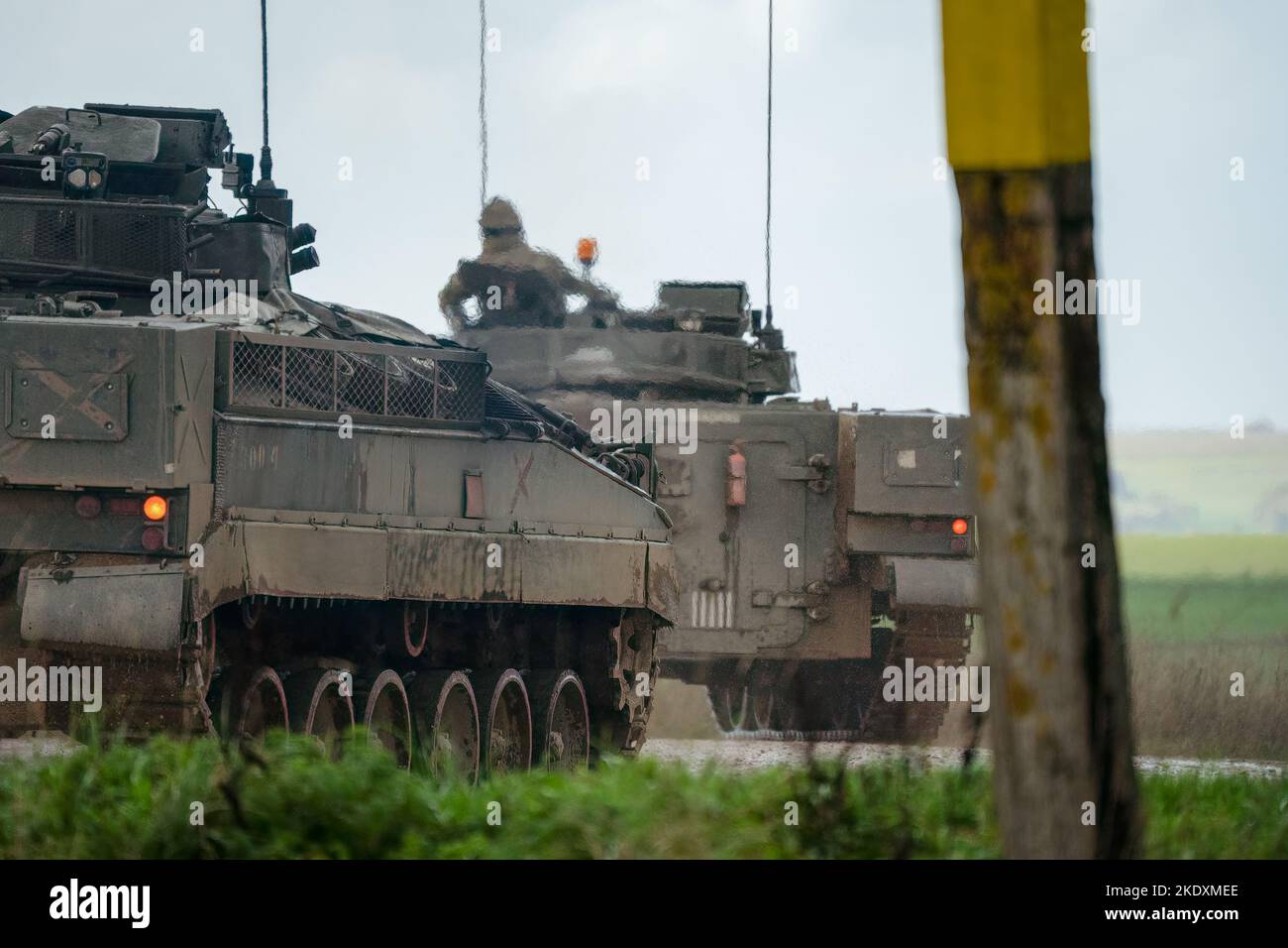 British army Warrior FV510 Fighting Vehicles crossing a sign posted ...