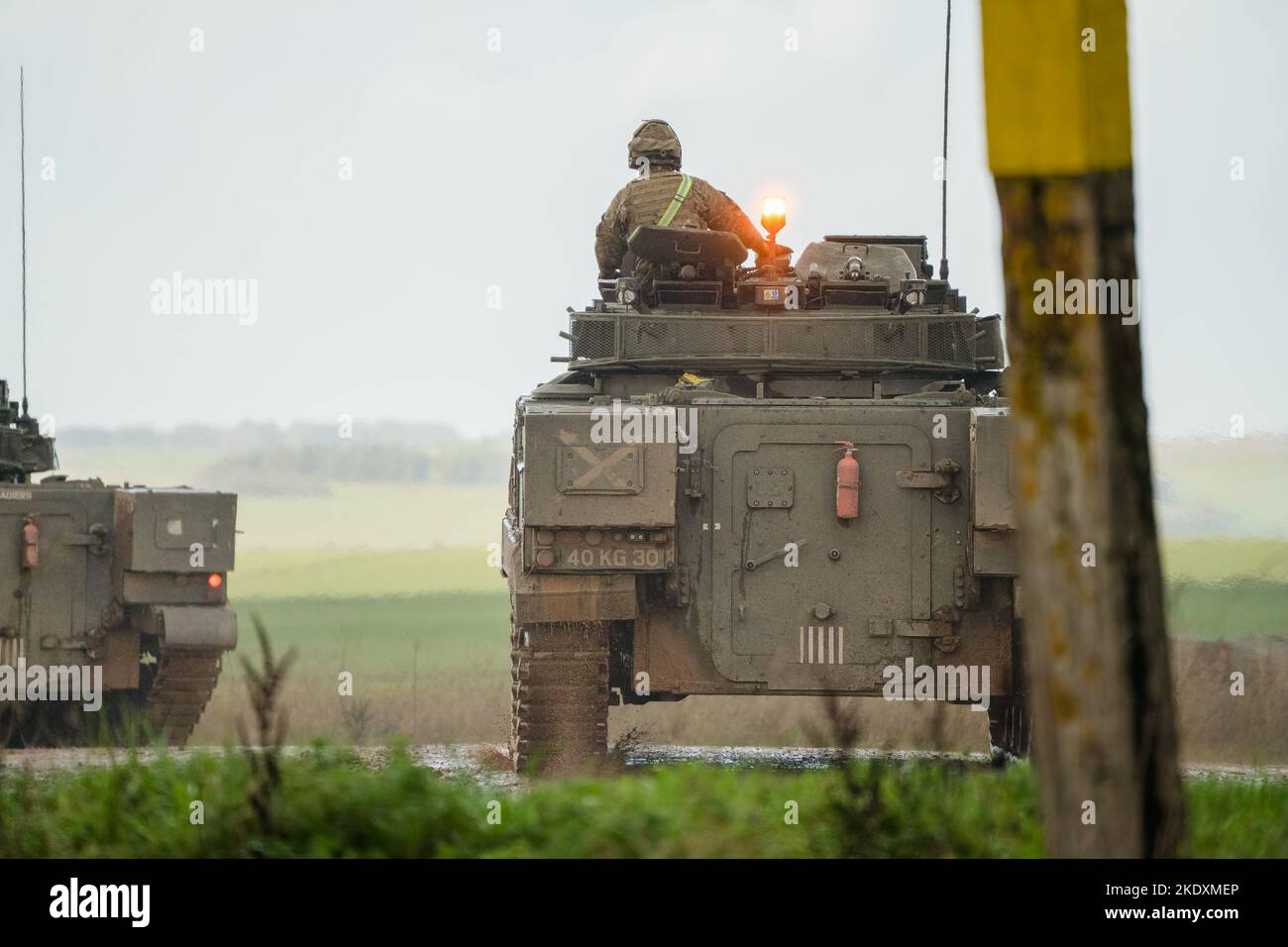 British army Warrior FV510 Fighting Vehicles crossing a sign posted ...