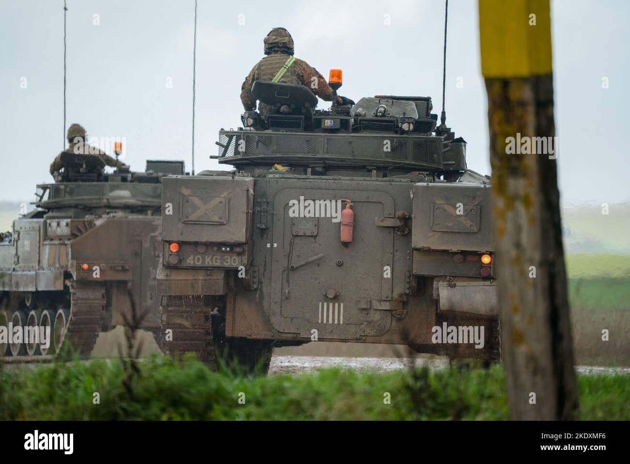British army Warrior FV510 Fighting Vehicles crossing a sign posted ...