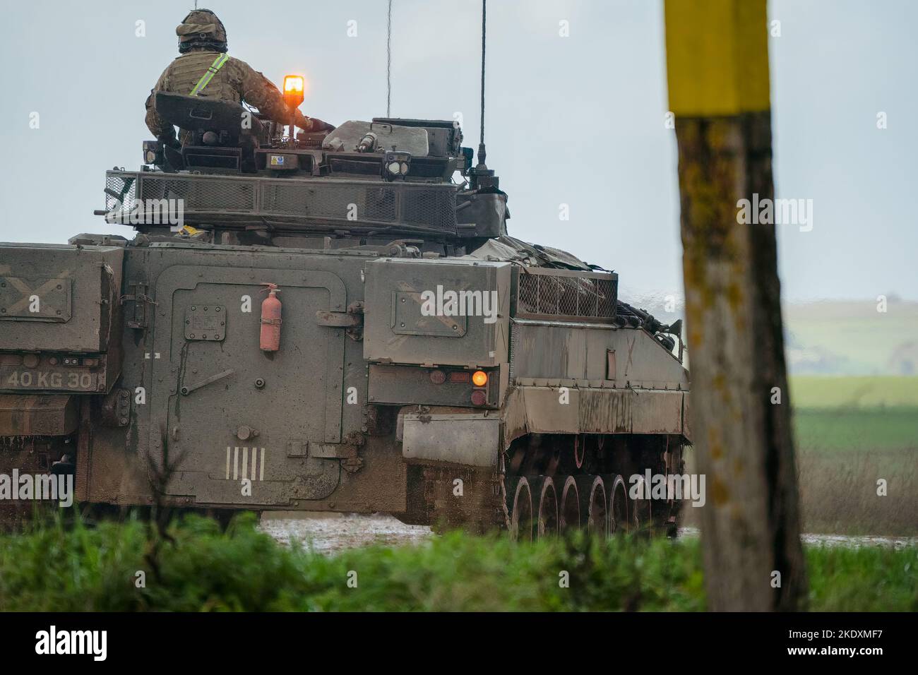 British army Warrior FV510 Fighting Vehicles crossing a sign posted ...