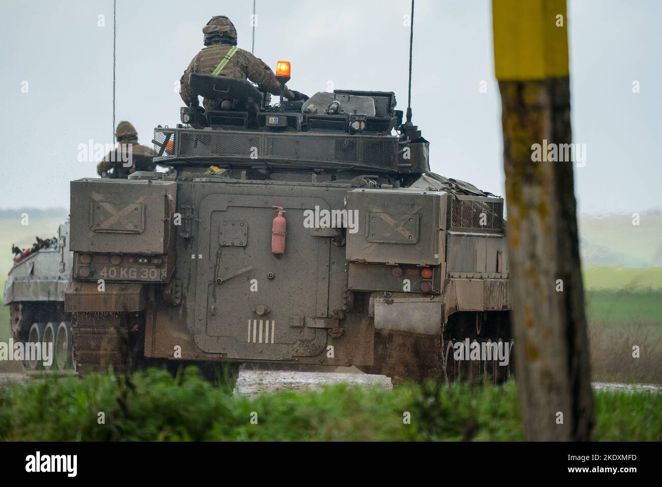 British army Warrior FV510 Fighting Vehicles crossing a sign posted ...