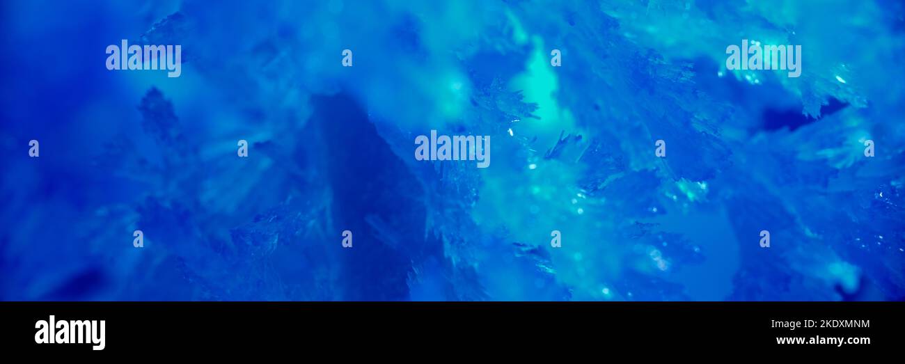 Frosty drawing in blue colour on window Stock Photo - Alamy