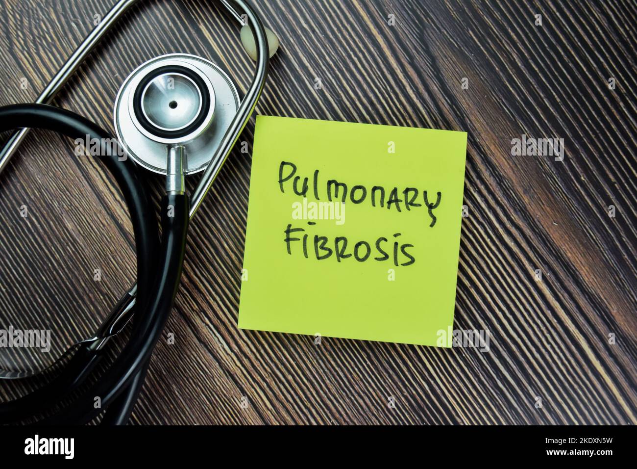Concept of Pulmonary Fibrosis write on sticky notes with stethoscope ...