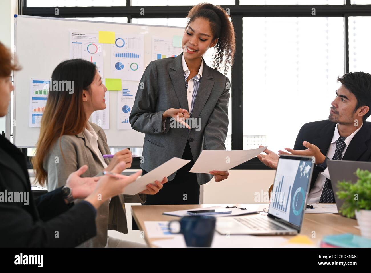 Smiling company employees giving hi-res stock photography and images ...