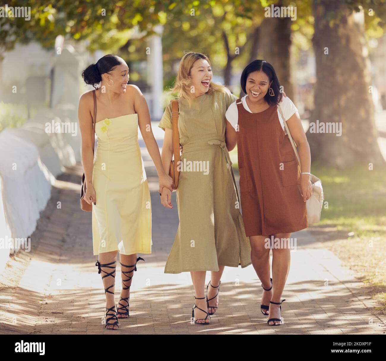 Happy, women and walking in park, laughing and relax in nature while ...