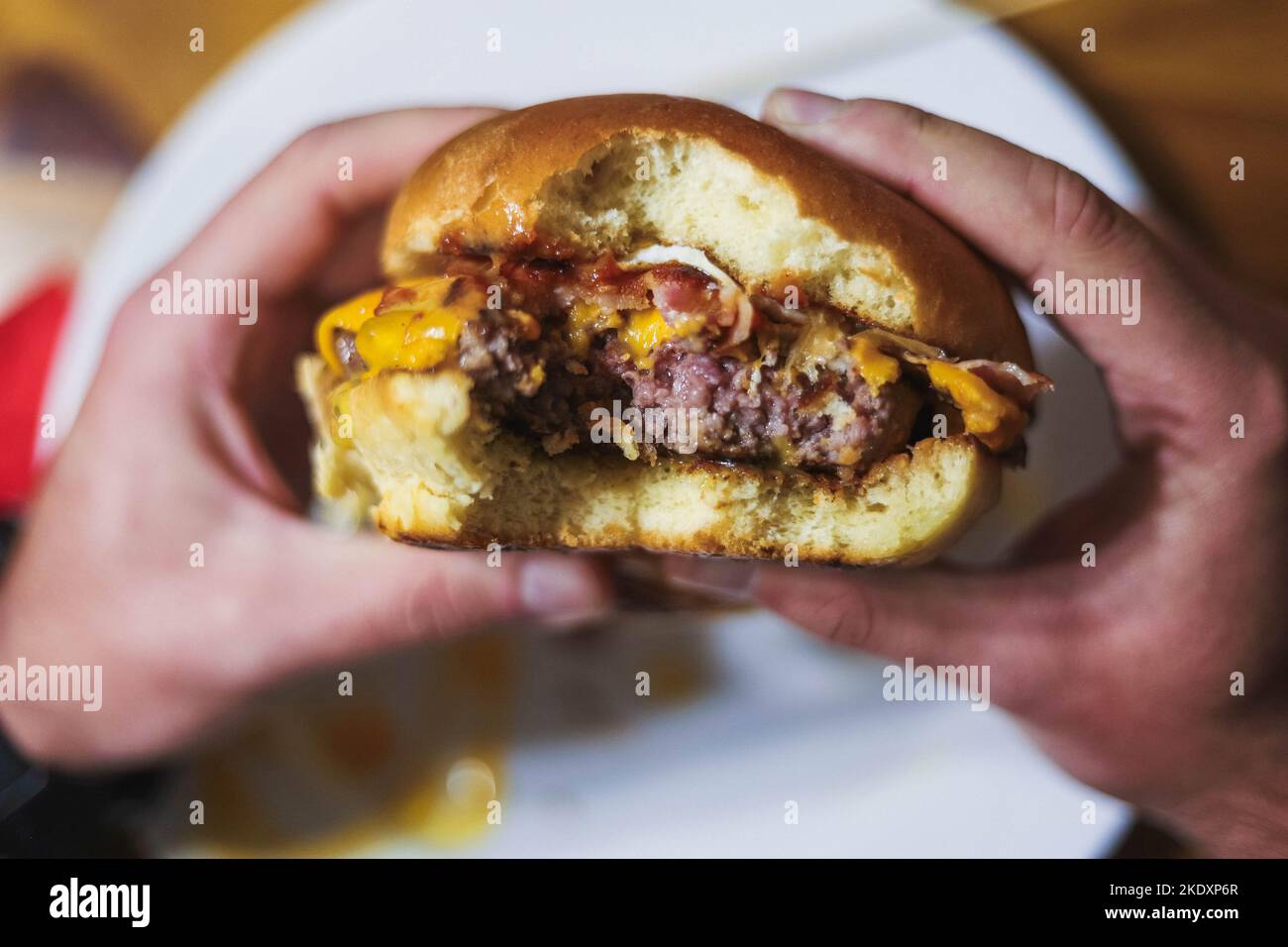 From above of crop anonymous person eating appetizing scrumptious ...