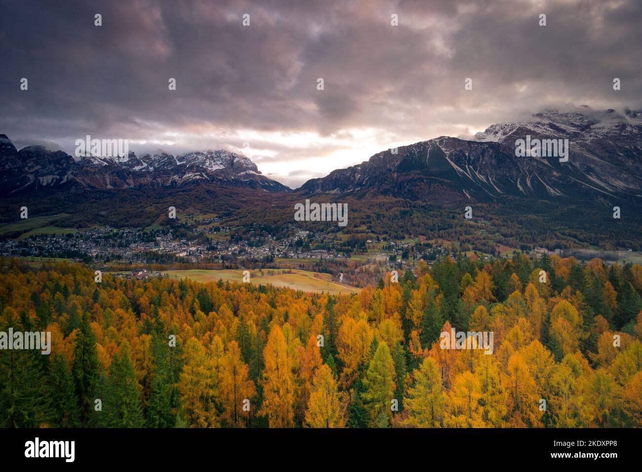 Majestic valley of Dolomite Alps with high mountains and deciduous ...