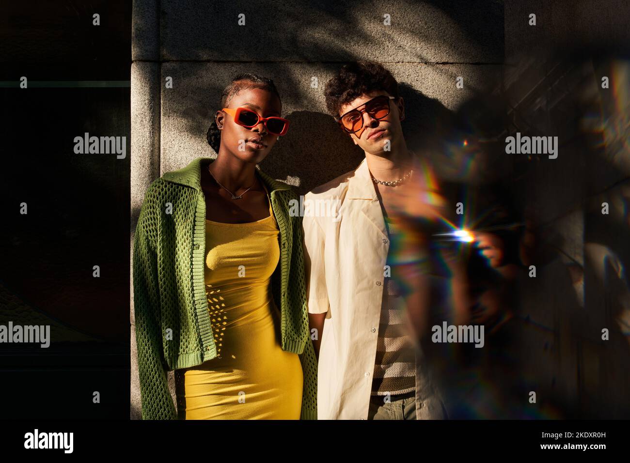 Stylish young confident multiracial couple in casual outfits and ...